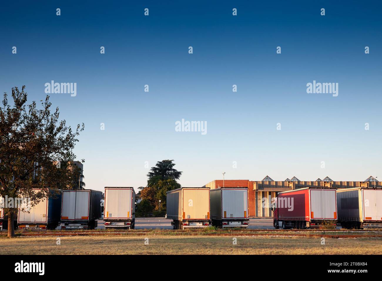 Picture of a row of semi trucks, european lorries and trucks, parked at ...