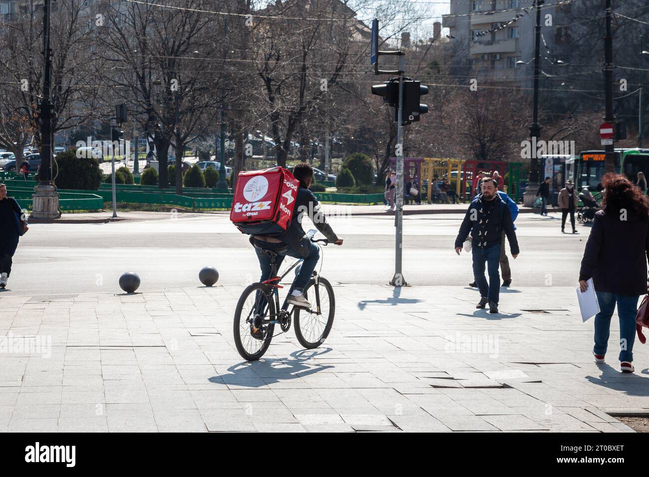 Picture of food delivery bag with the logo of tazz carried by a ...
