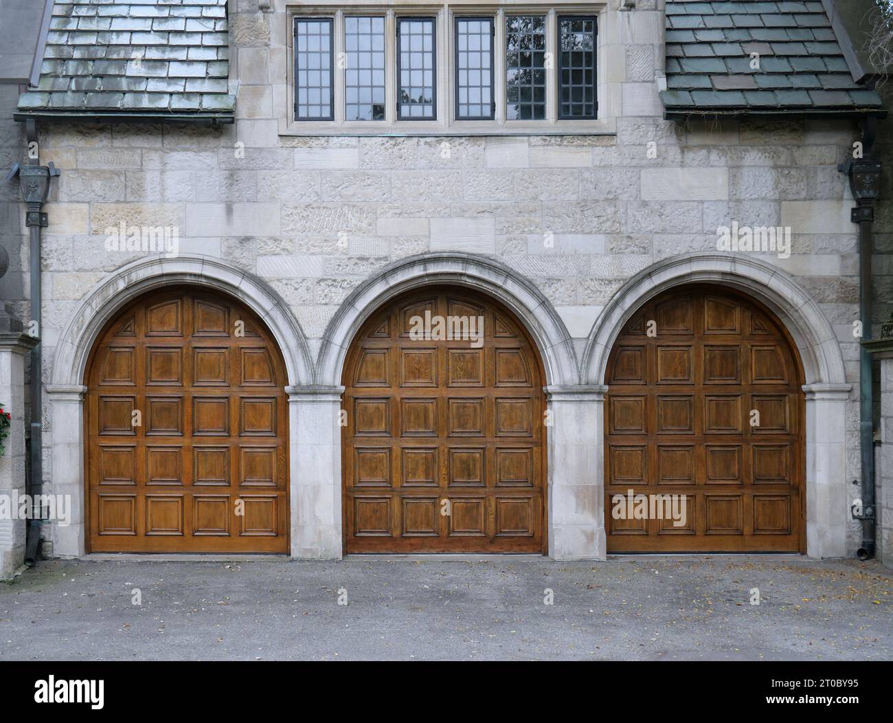 Garage of old stone gothic mansion Stock Photo - Alamy