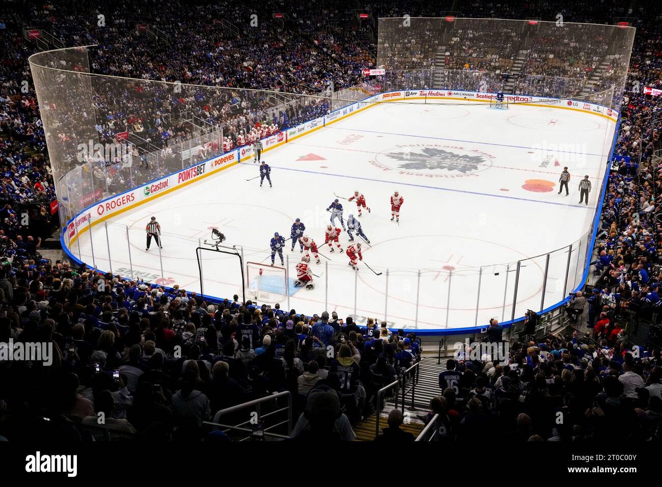 The Toronto Maple Leafs pressure the Detroit Red Wings' goal during the third period of an NHL ...