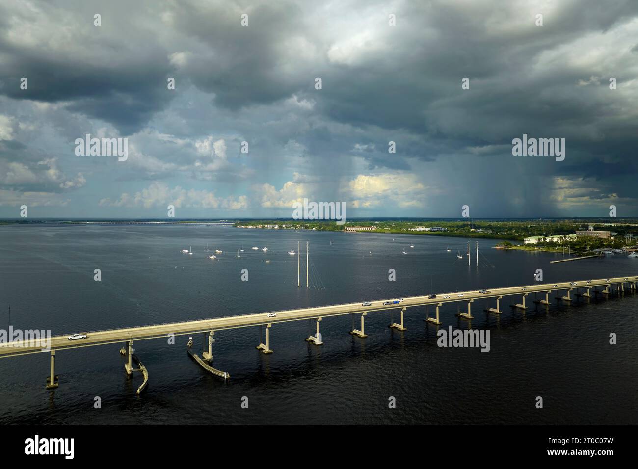 Stormy clouds forming from evaporating humidity of ocean water before ...