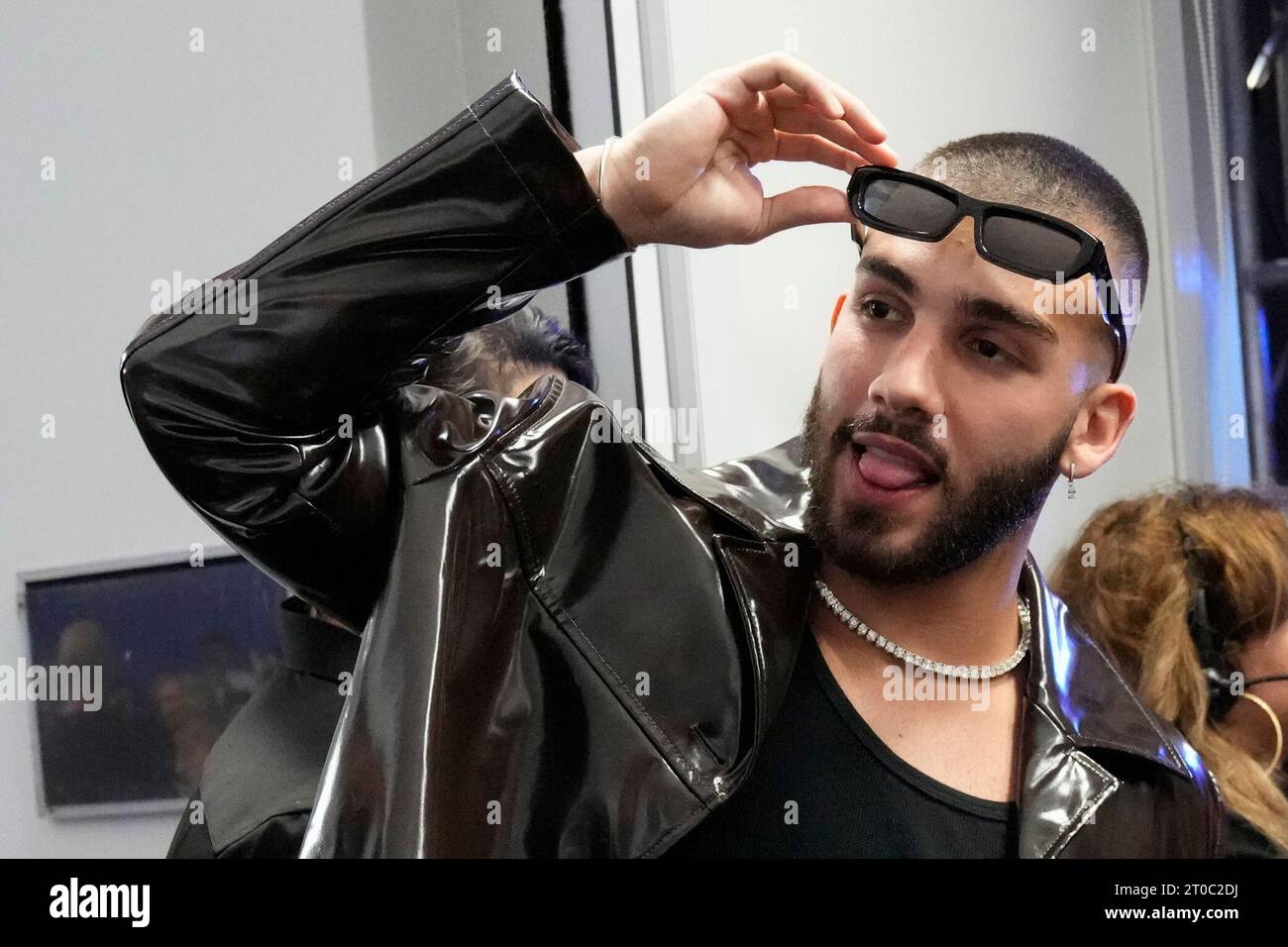Colombian singer Manuel Turizo makes a face toward photographers as he ...