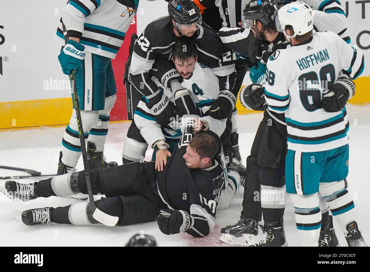 Los Angeles Kings left wing Pierre-Luc Dubois, bottom, and San Jose ...