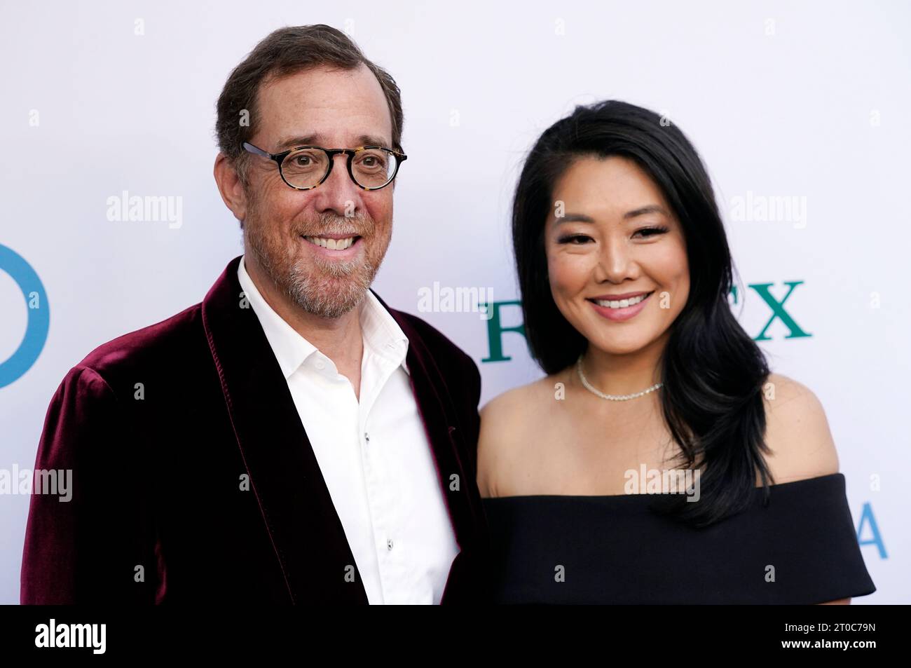 Crystal Kung Minkoff and her husband Rob pose together at the 2023 Los ...