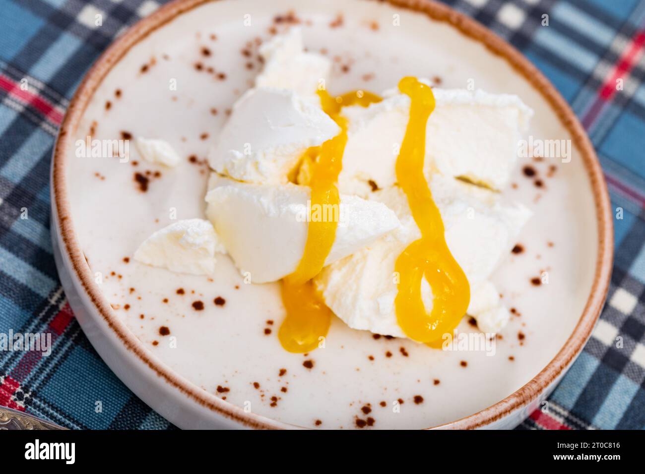 Mato con miel, soft cheese from sheep milk served with honey Stock ...