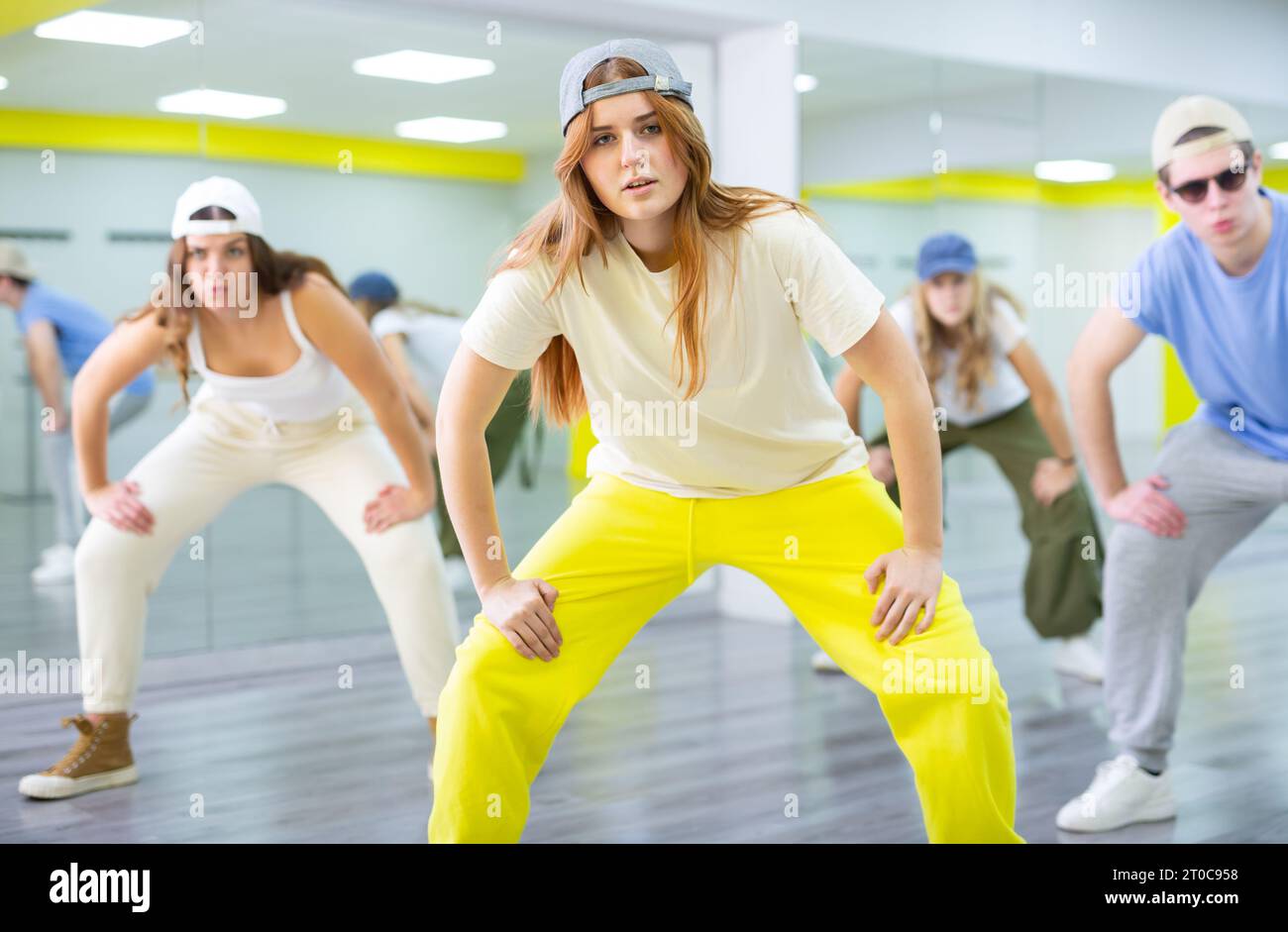 Flexible and energetic male and female teenage dancers having fun ...