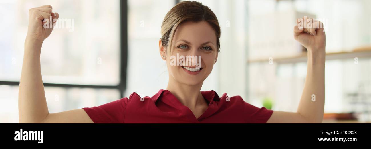 Strong woman shows muscles hi-res stock photography and images - Alamy