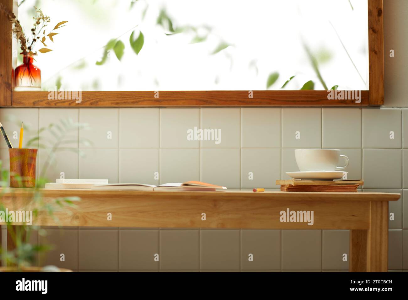 A comfortable room where warm afternoon sunlight comes in through a ...