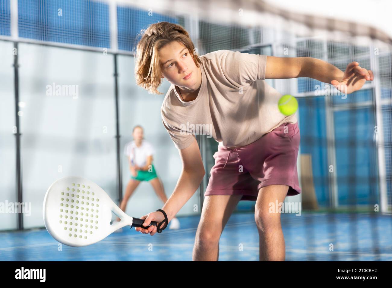 Portrait of a guy tennis player playing padel Stock Photo - Alamy