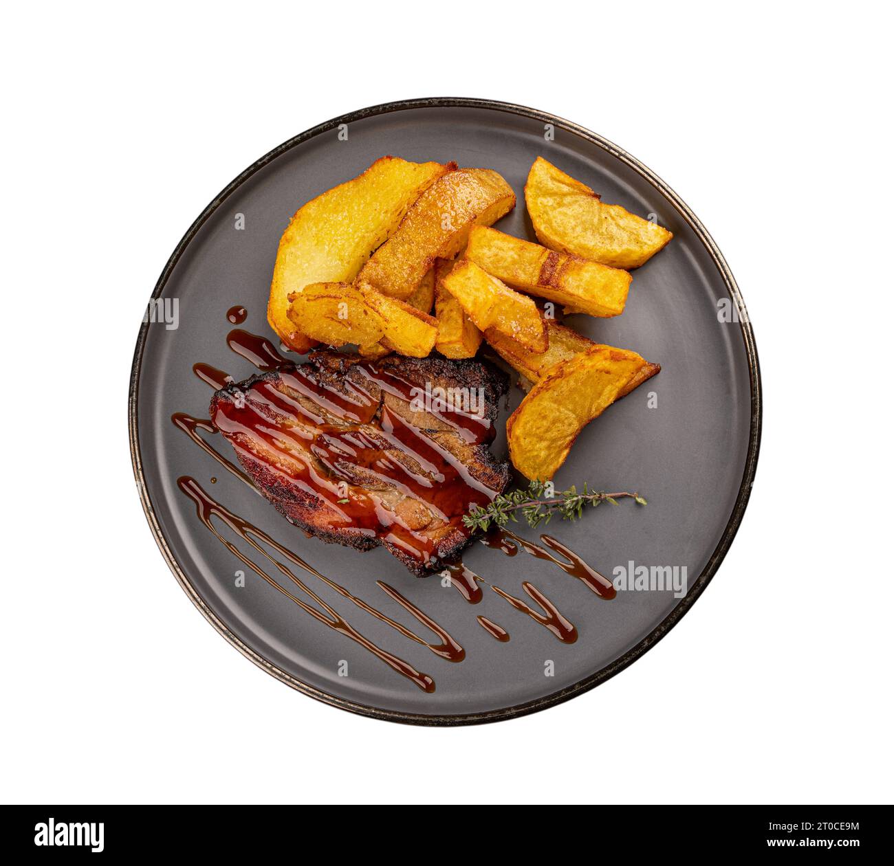 Delicious grilled beef steak and rustic potatoes wedges Stock Photo - Alamy