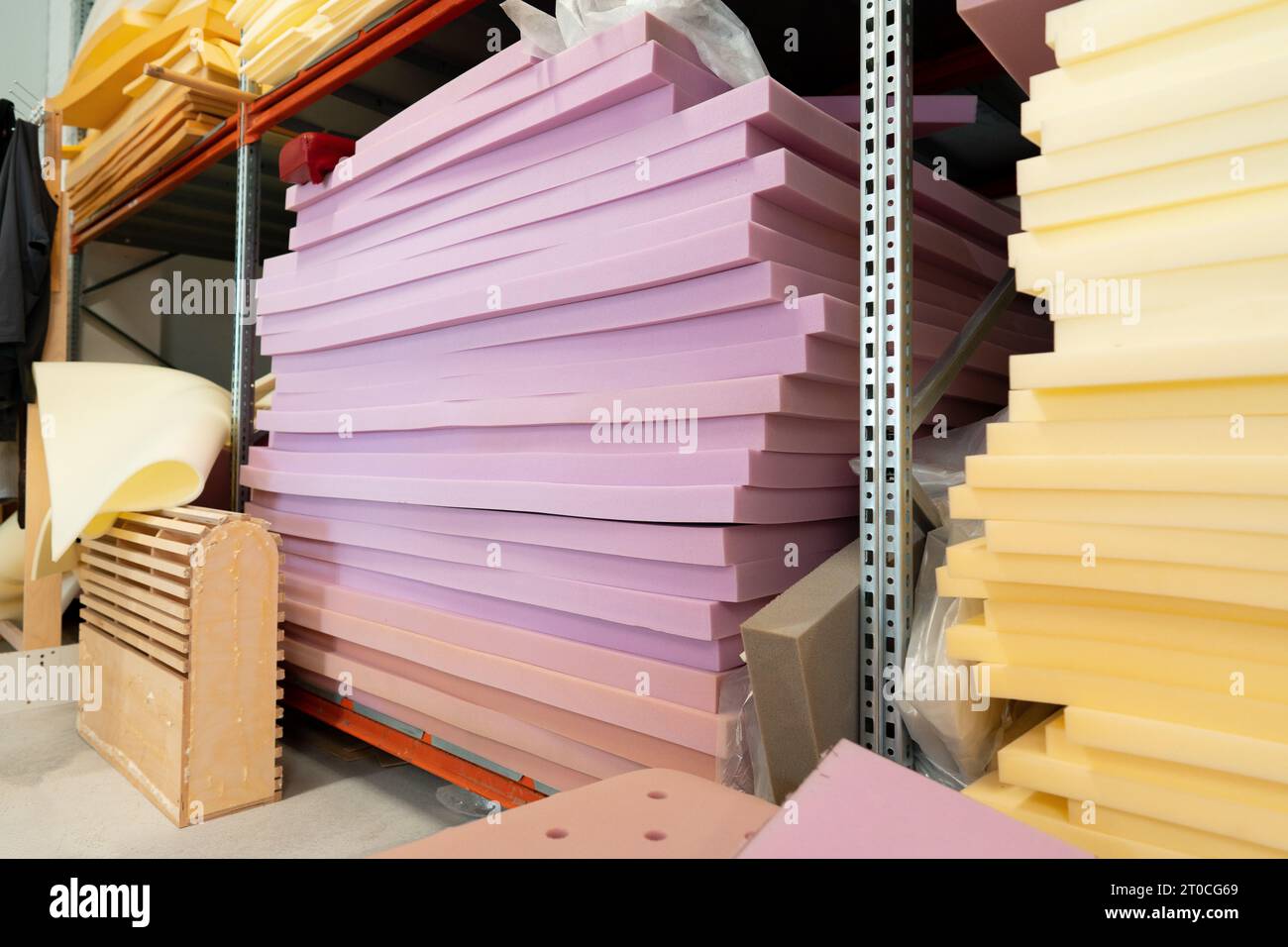 Stacked sheets of foam rubber for furniture production in factory ...
