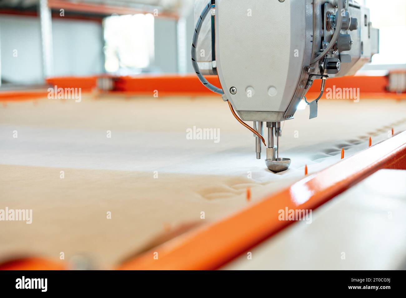 Automatic industrial sewing machine for stitching fabric Stock Photo ...