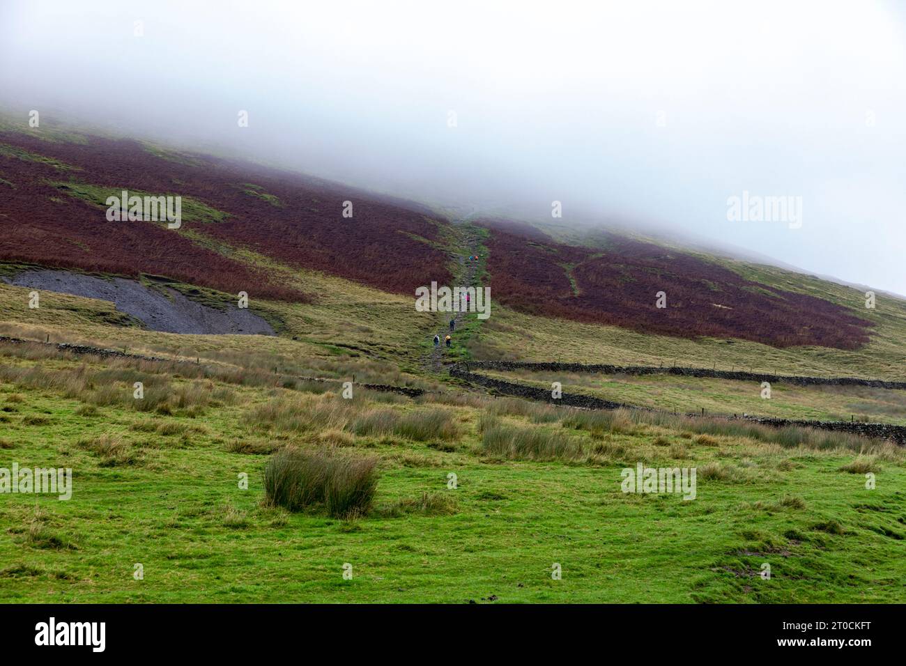 Pendle Hill Lancashire hikers walk up the challenging route to summit ...