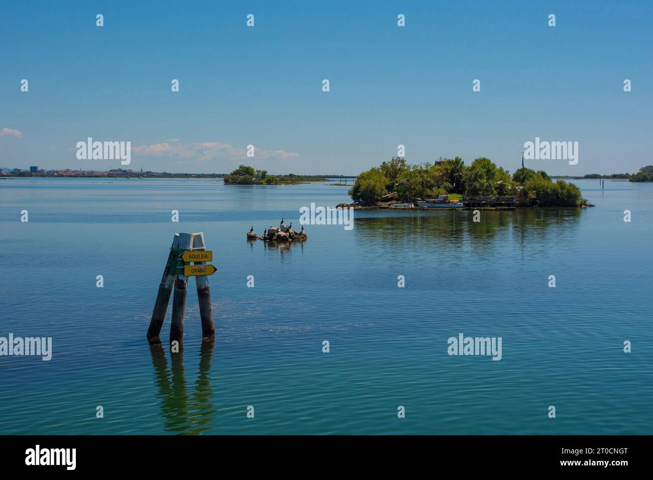 A sign post for Lignano and Aquileia in the Grado part of Marano and ...