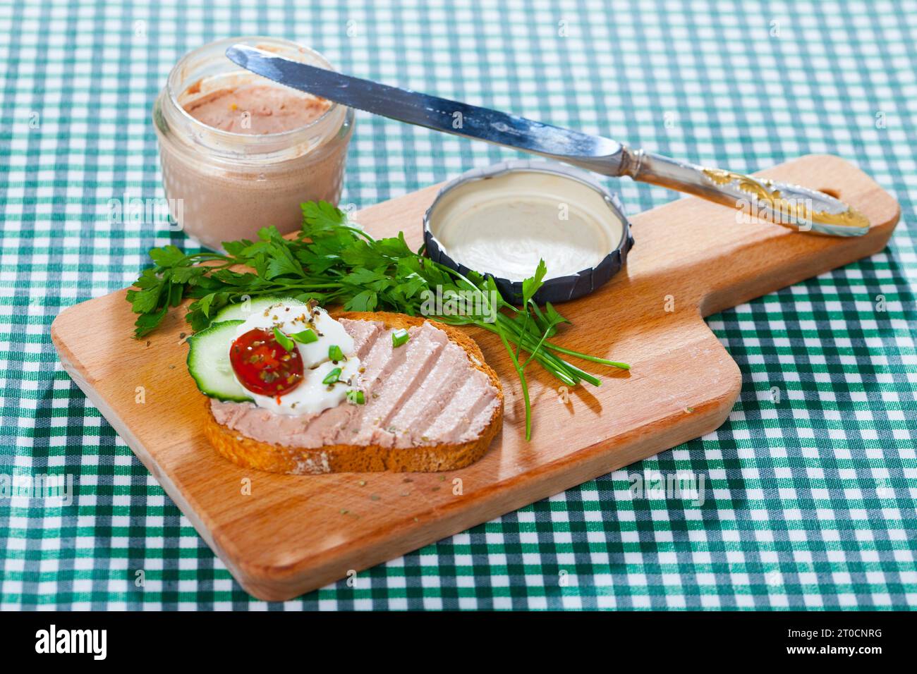 Canape with pate and young cheese at fresh bread, served with greens ...