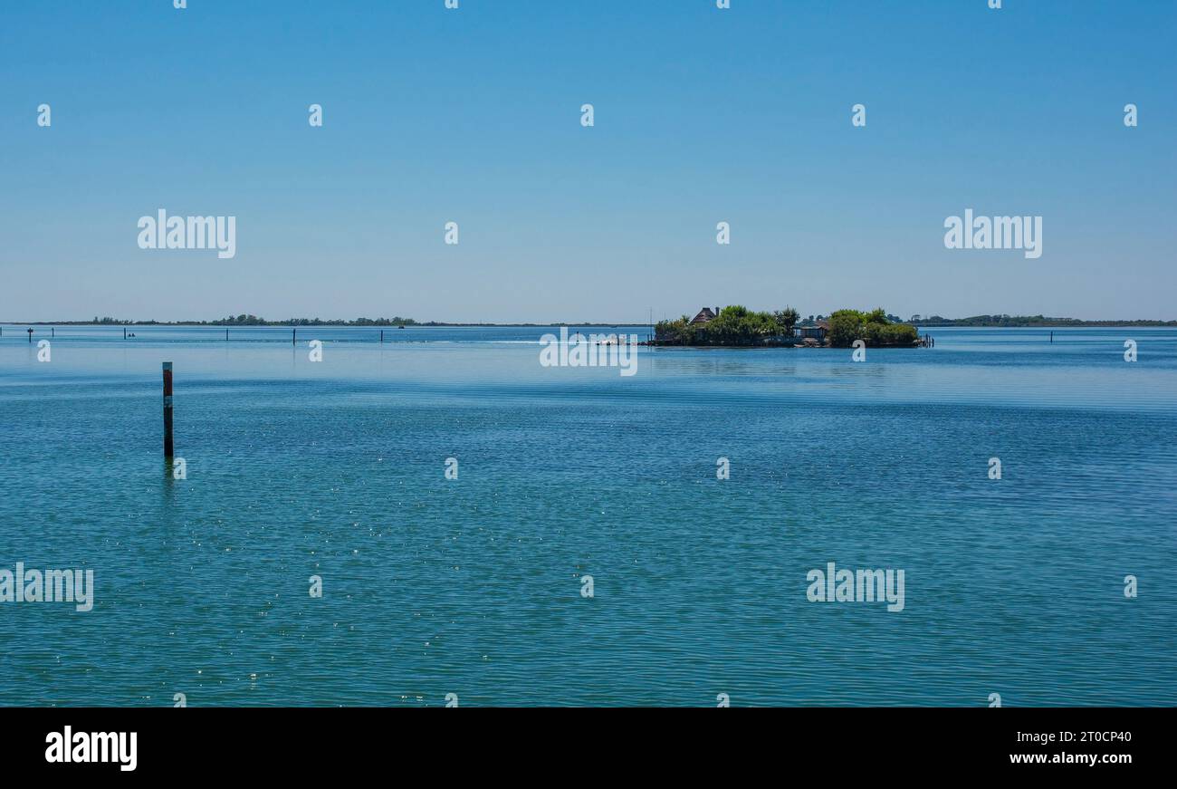 An island in the Grado section of the Marano and Grado Lagoon in Friuli ...