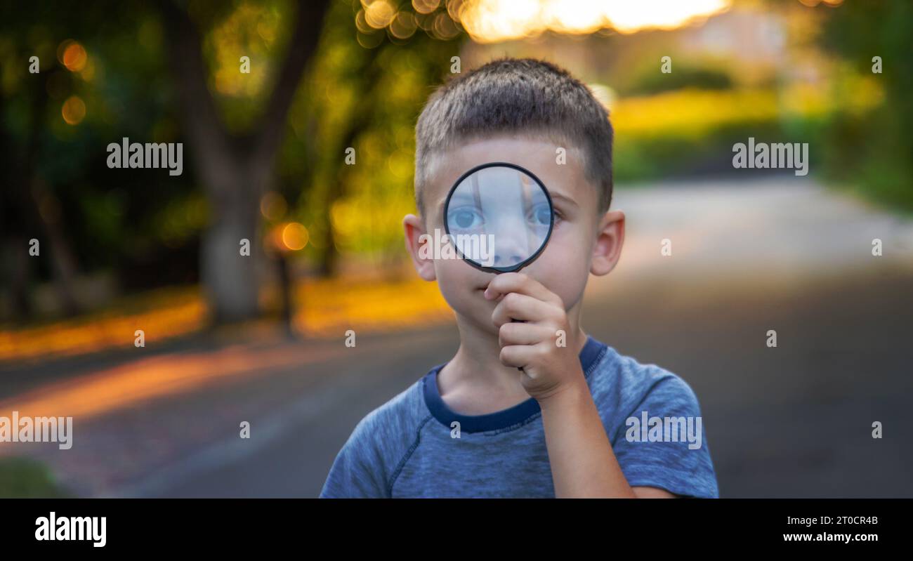 Little boy curious looking cute discovery hi-res stock photography and ...