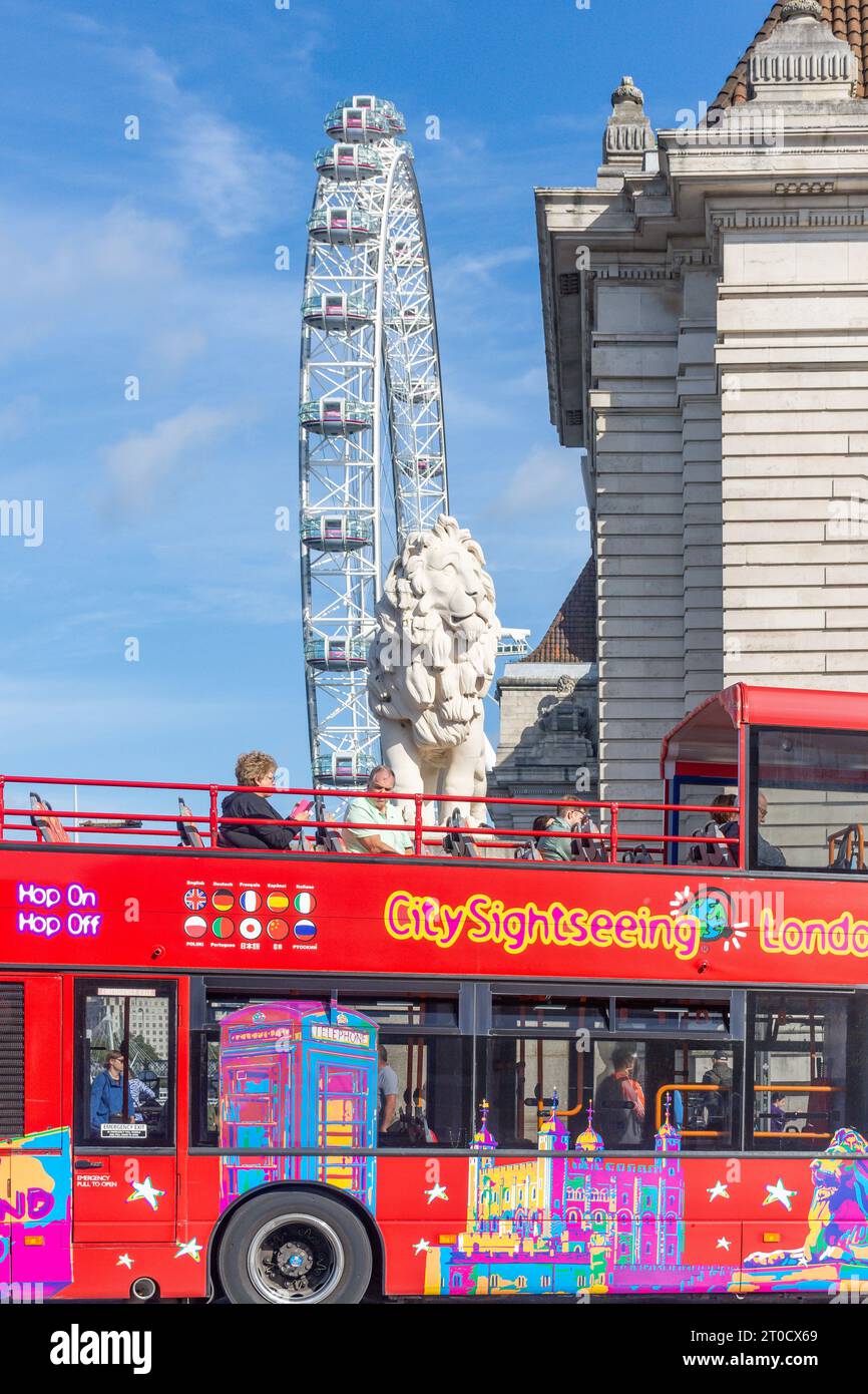 Open top buses double decker london eye wheel city sightseeing b hi-res stock photography and ...