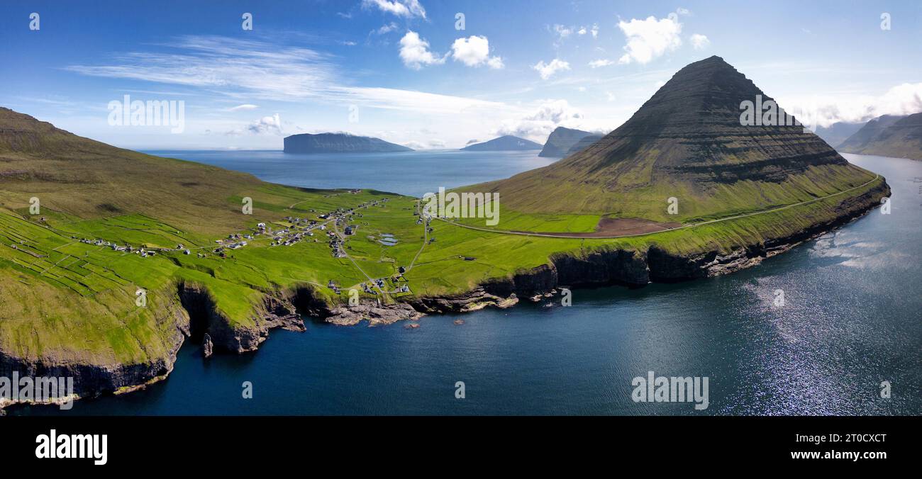 Drone view of Volcano mountain landscape with ocean - Bordoy Vidareidi ...
