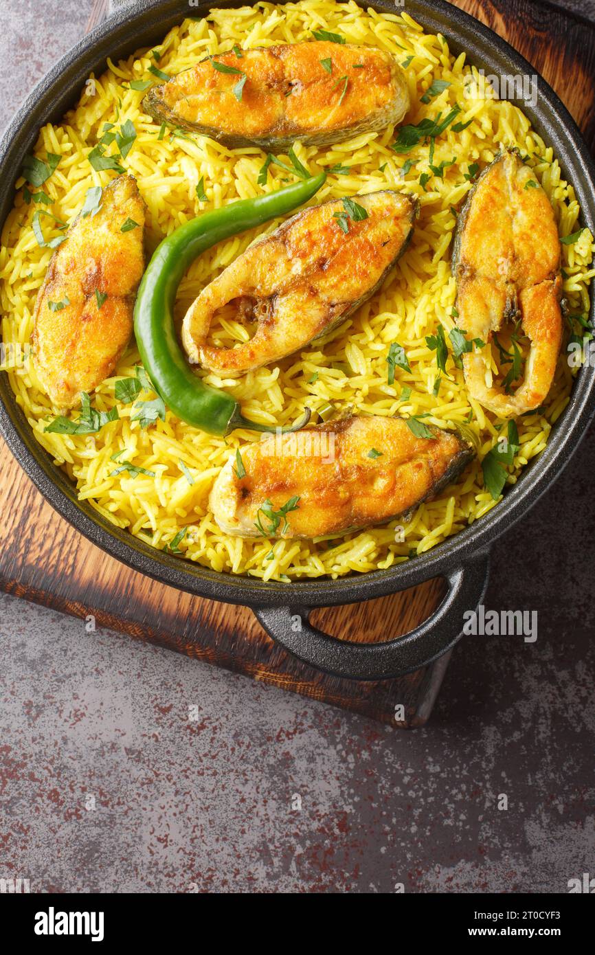 Ilish Pulao Bengali Style Hilsa Fish Pilaf closeup on the plate on the ...