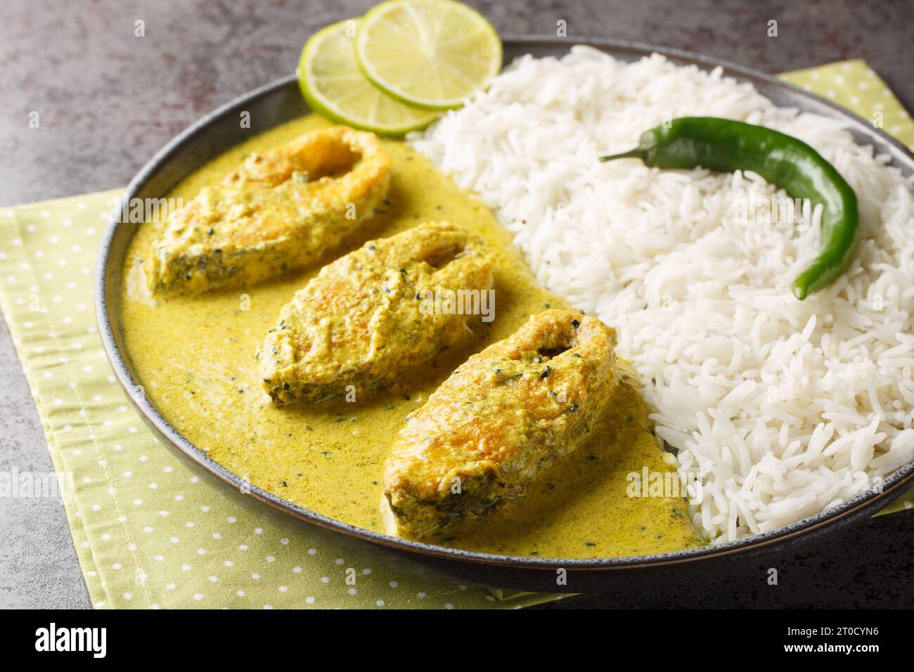 Bengali Shorshe Ilish or Hilsa cooked in Mustard Gravy served with ...
