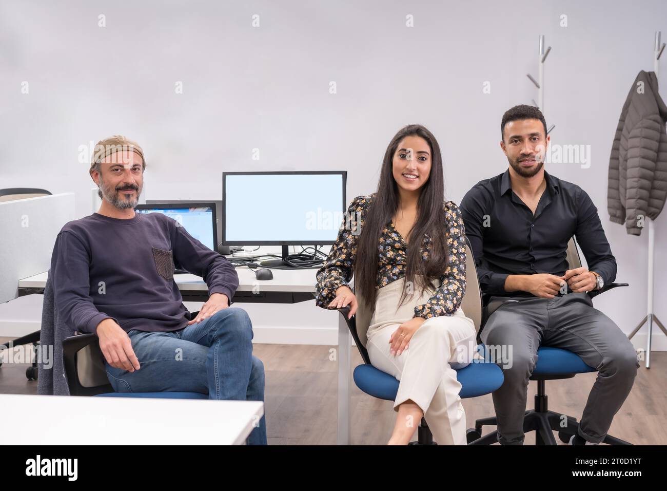 Three male office workers hi-res stock photography and images - Alamy