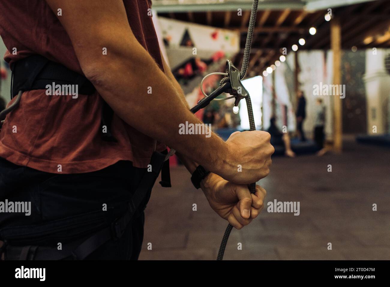 Person climbing a rope ladder hi-res stock photography and images - Alamy
