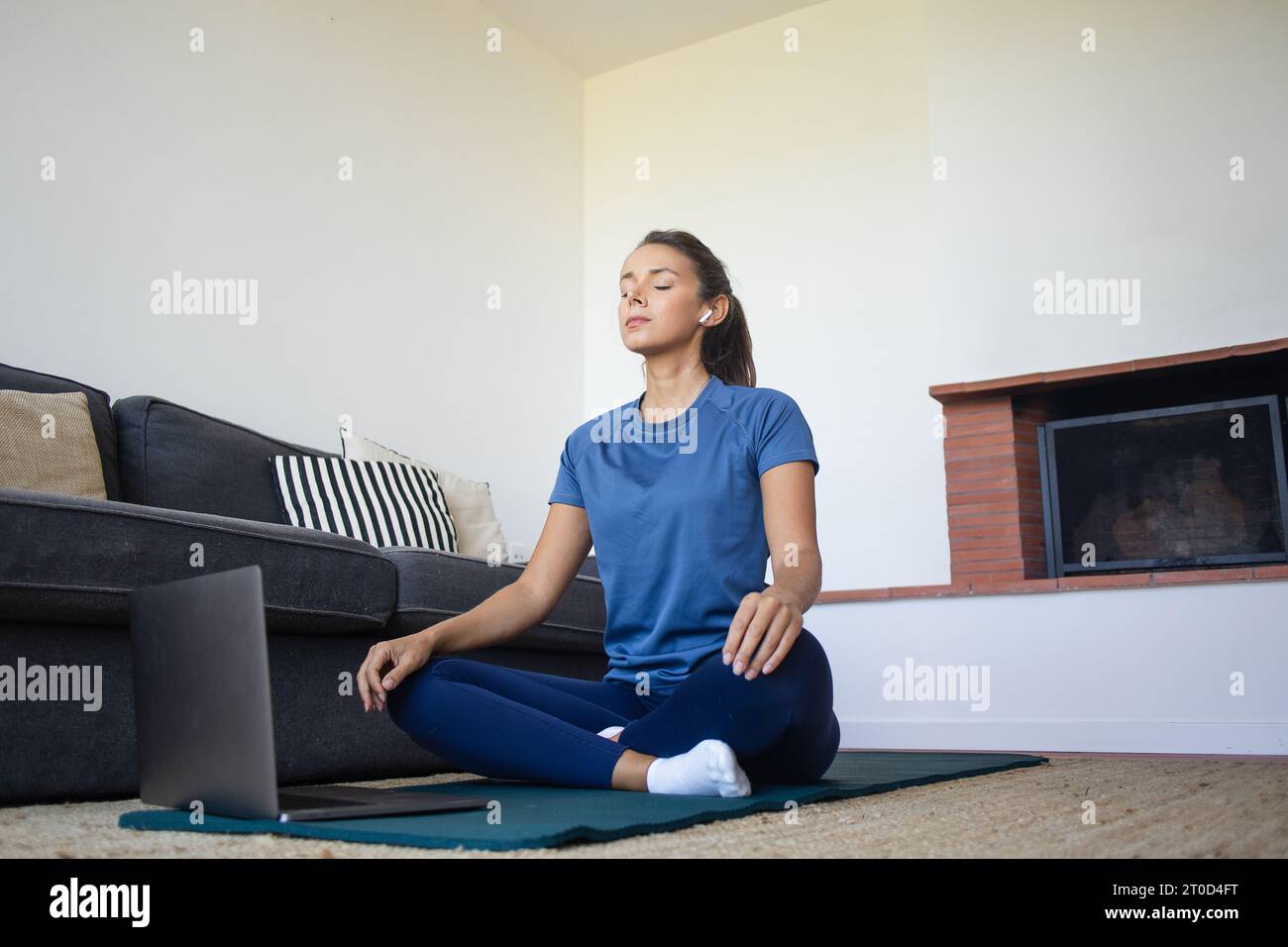 Peaceful mind meditating woman home hi-res stock photography and images ...
