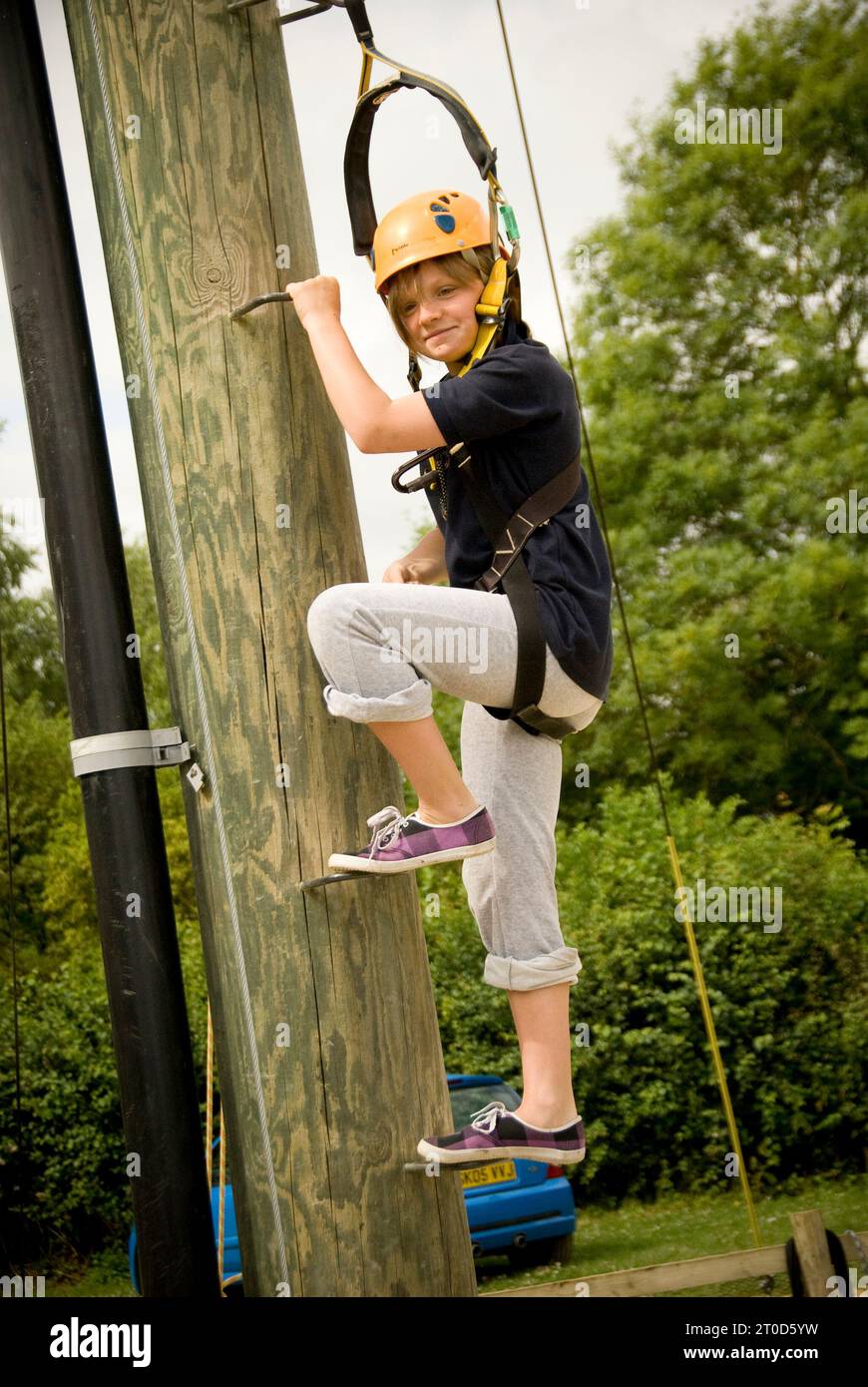Secondary school pupils climbing on an outward bound course Stock Photo ...
