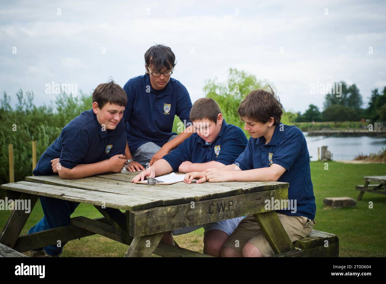 Secondary school male pupils orienteering while on outward bound course ...