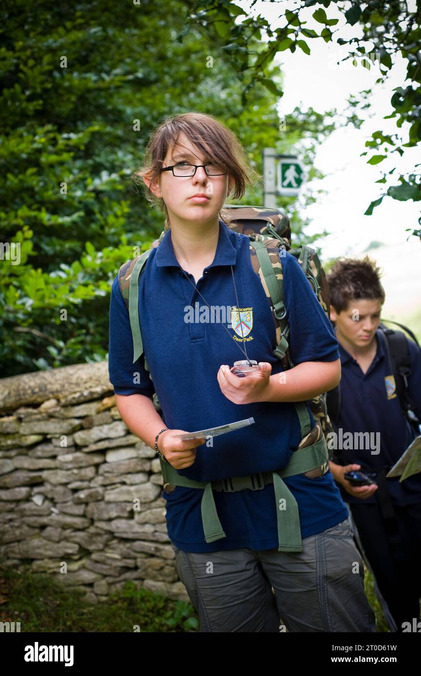 Secondary school pupils orienteering while on outward bound course ...