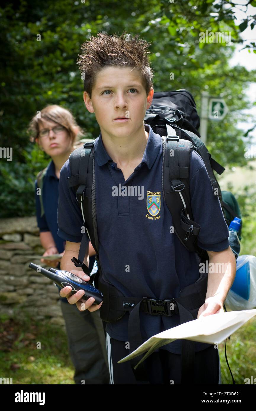 Secondary school pupils orienteering while on outward bound course ...