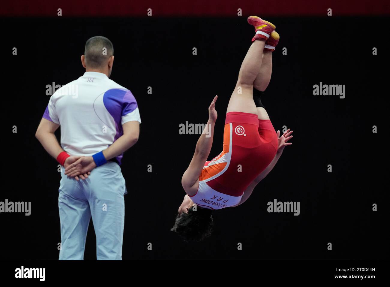 North Korea's Mun Hyongyong flips as she celebrates her win over Japan ...