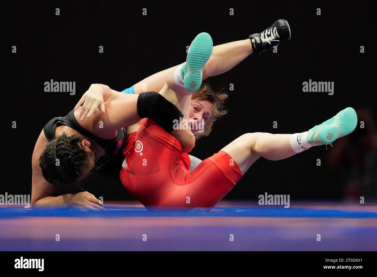 Kazakhstan's Yelena Shalygina, right, and Mongolia's Delgermaa ...