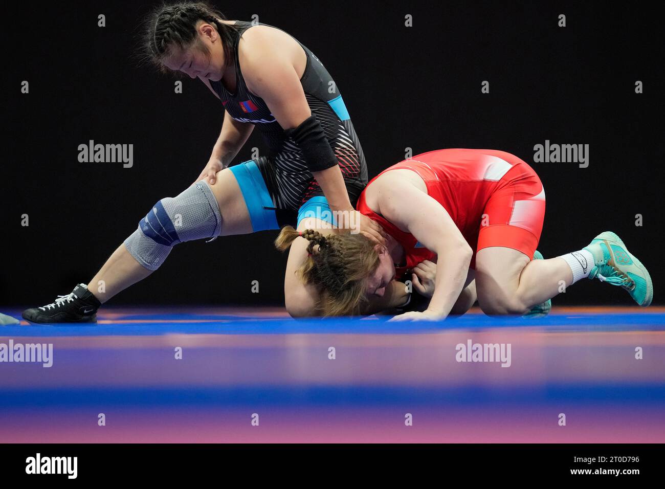 Kazakhstan's Yelena Shalygina, bottom, and Mongolia's Delgermaa ...