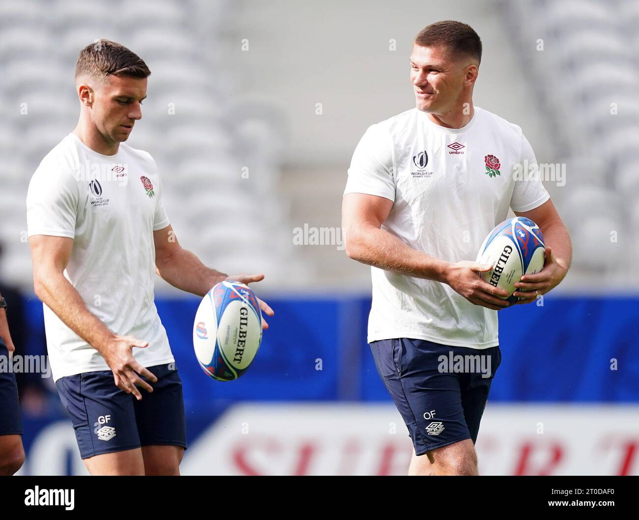 England's George Ford and Owen Farrell (right) during a team run at the ...
