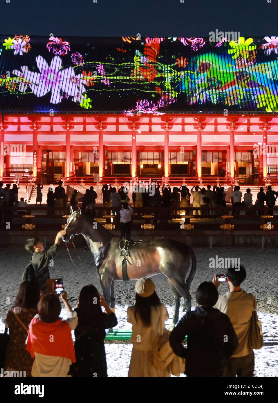 The Daigokuden Hall and a horse statue are projected by projection ...