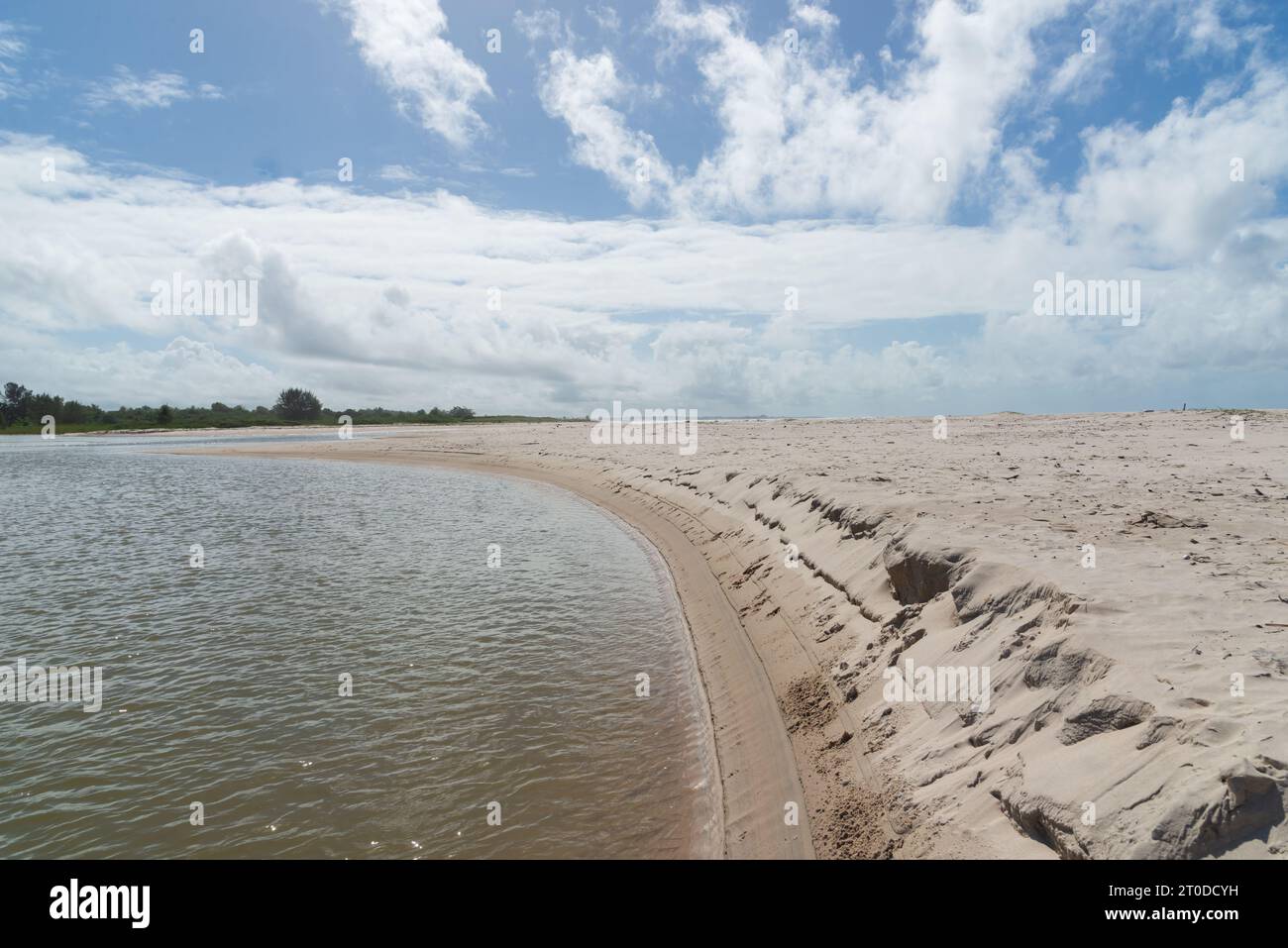 Waters from a river that flows into the sea. white sand on the beach ...