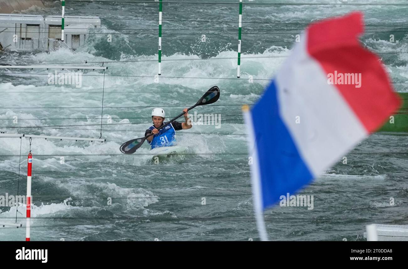 Carole Bouzidi, of Algeria, competes during the women's Kayak Slalom ...