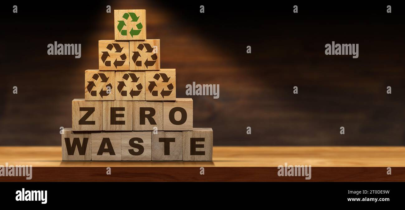 Stack of wooden blocks with text Zero Waste and Recycling Symbols ...