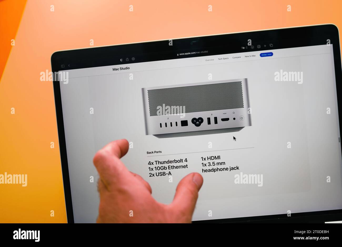 Paris, France - Jun 6, 2023: Male hand pointing to the Mac Studio ...