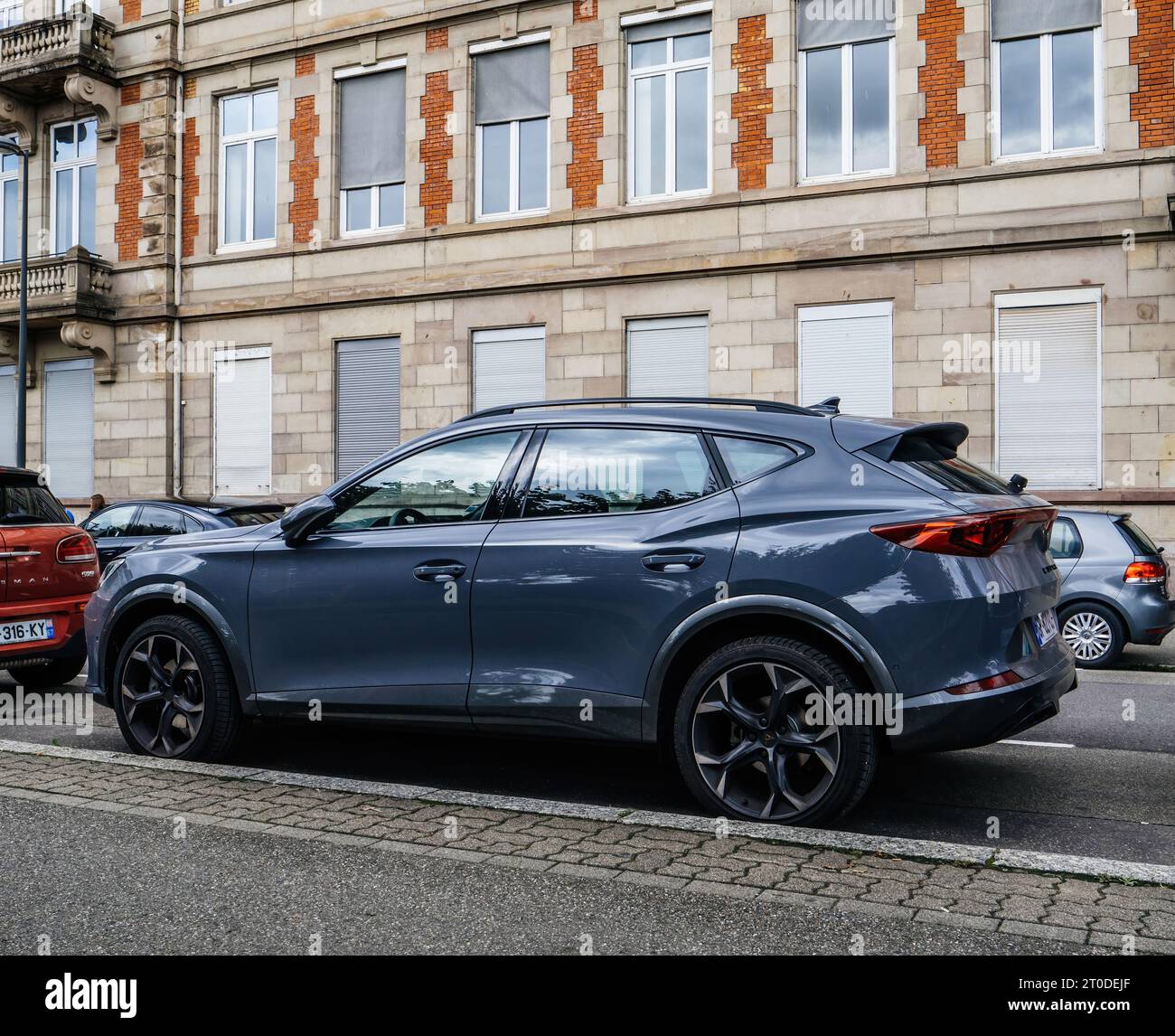 Strasbourg, France - Ju 27, 2023: A side view of a luxurious blue Cupra ...