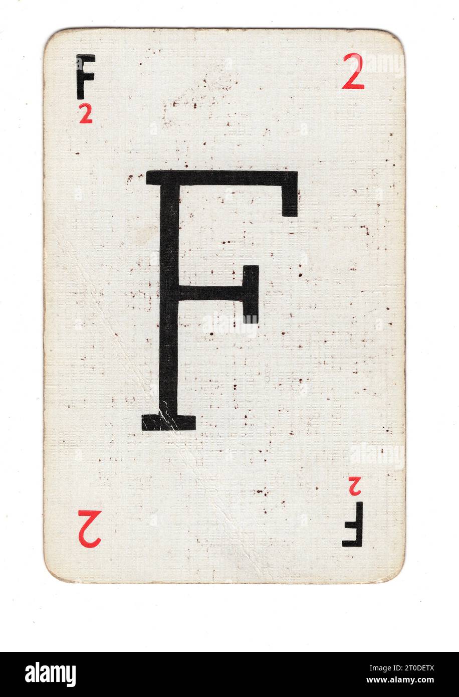 A vintage Lexicon playing card featuring the letter F on a white ...
