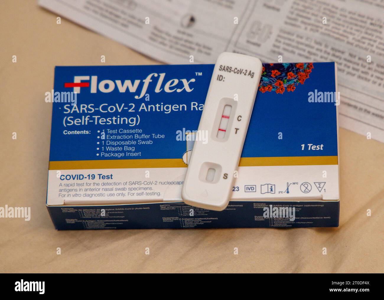 A girl does a Flowflex SARS-Cov-Antigen Rapid Test and gets a positive ...