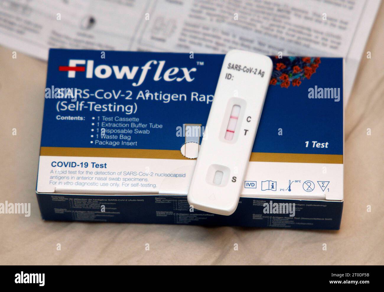 A girl does a Flowflex SARS-Cov-Antigen Rapid Test and gets a positive ...