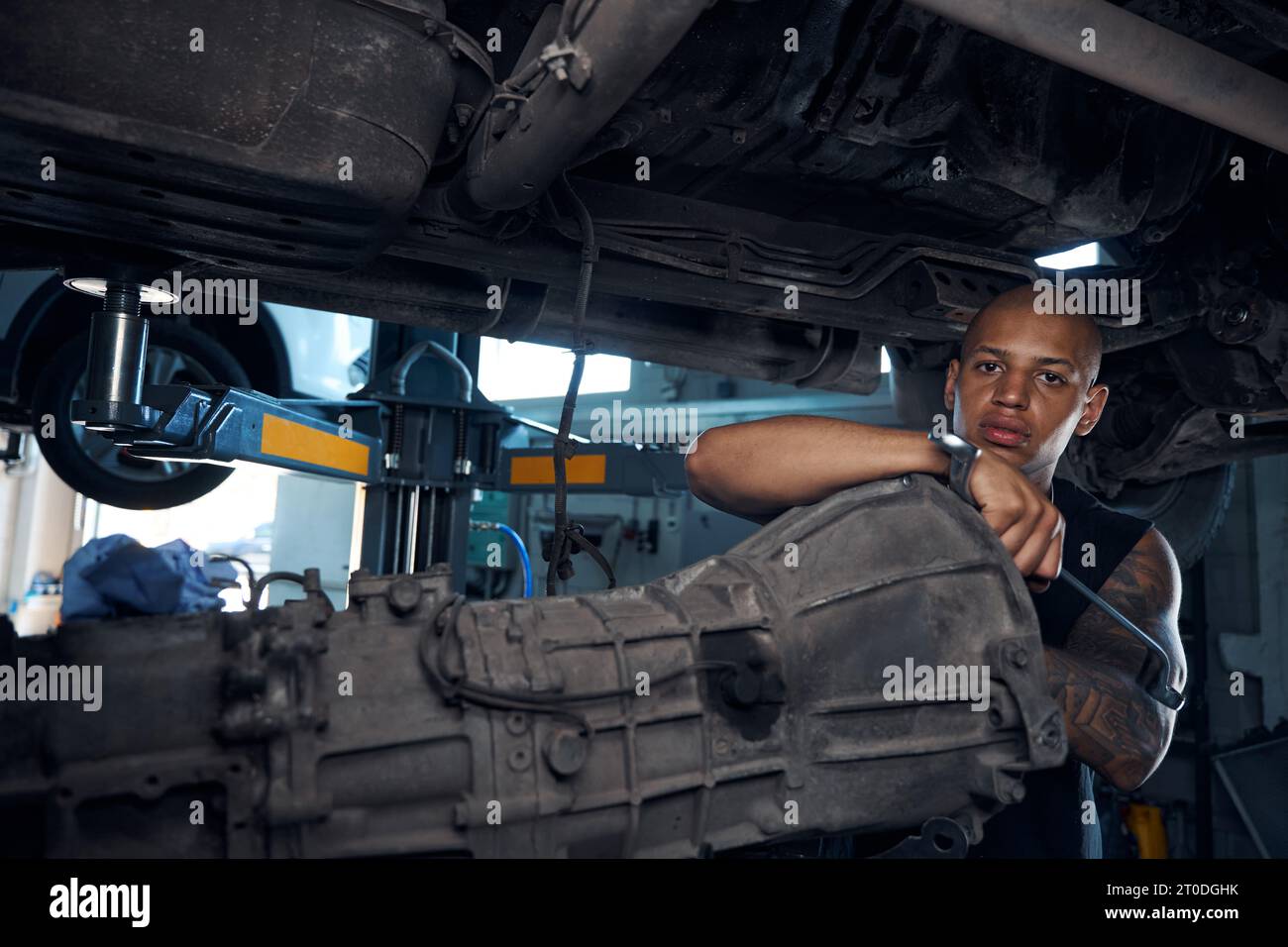 African mechanic under car hi-res stock photography and images - Alamy