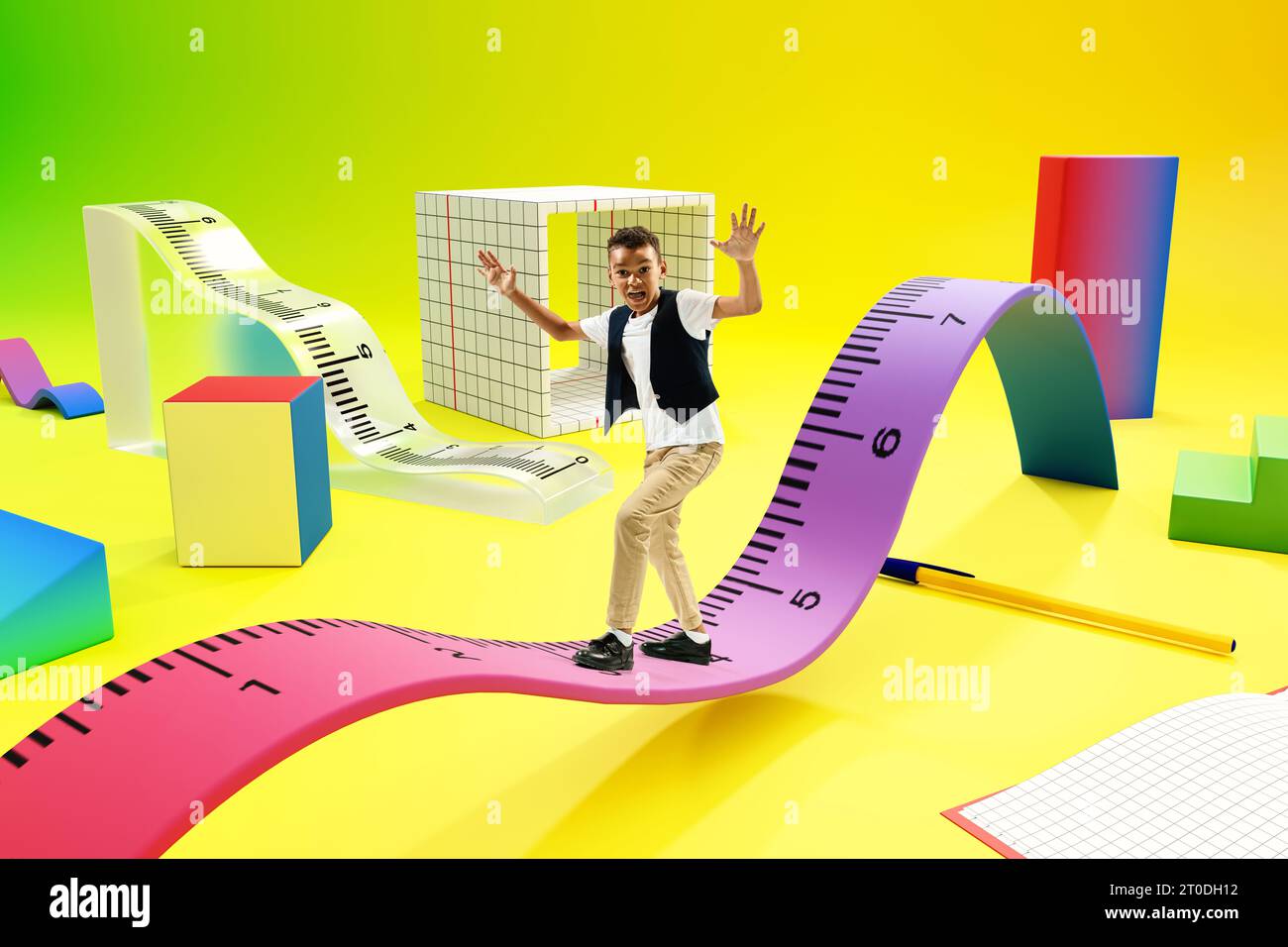 Playful little boy, child playing on 3D items, school supplies, riding ...