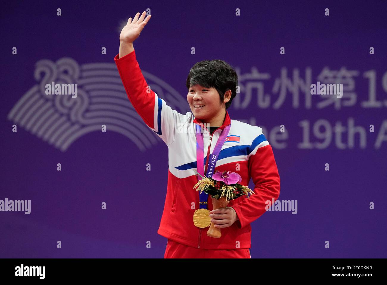 Gold medalist North Korea's Mun Hyongyong celebrates during the victory ...