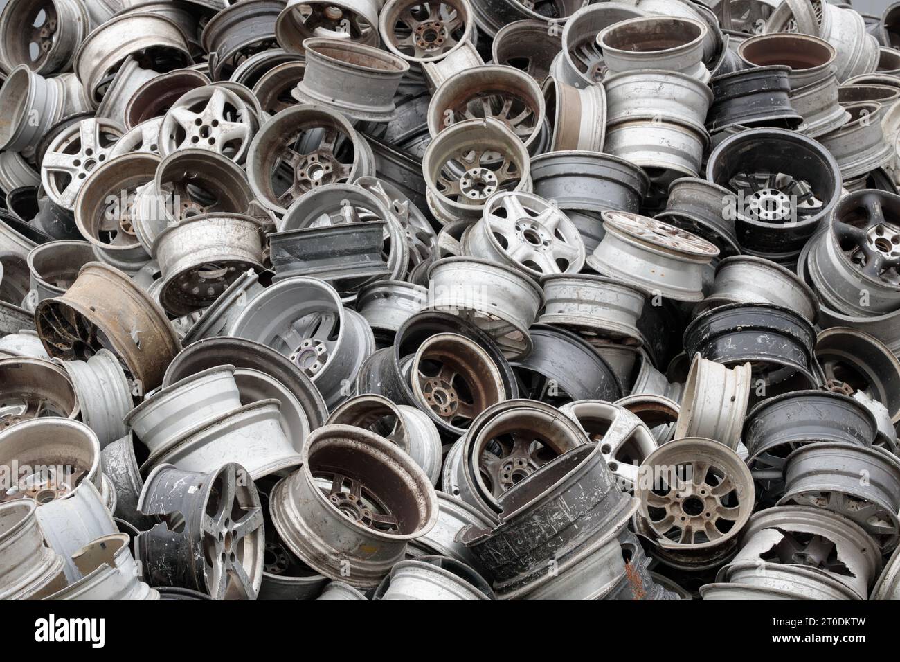 Scrapheap Junkyard with Old Car Rims. Closeup. Stack of old discarded ...