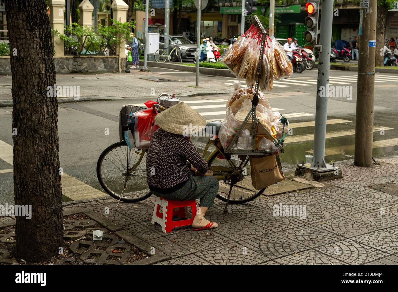 A street food vendor waiting for business at some Ho Chi Minh City ...